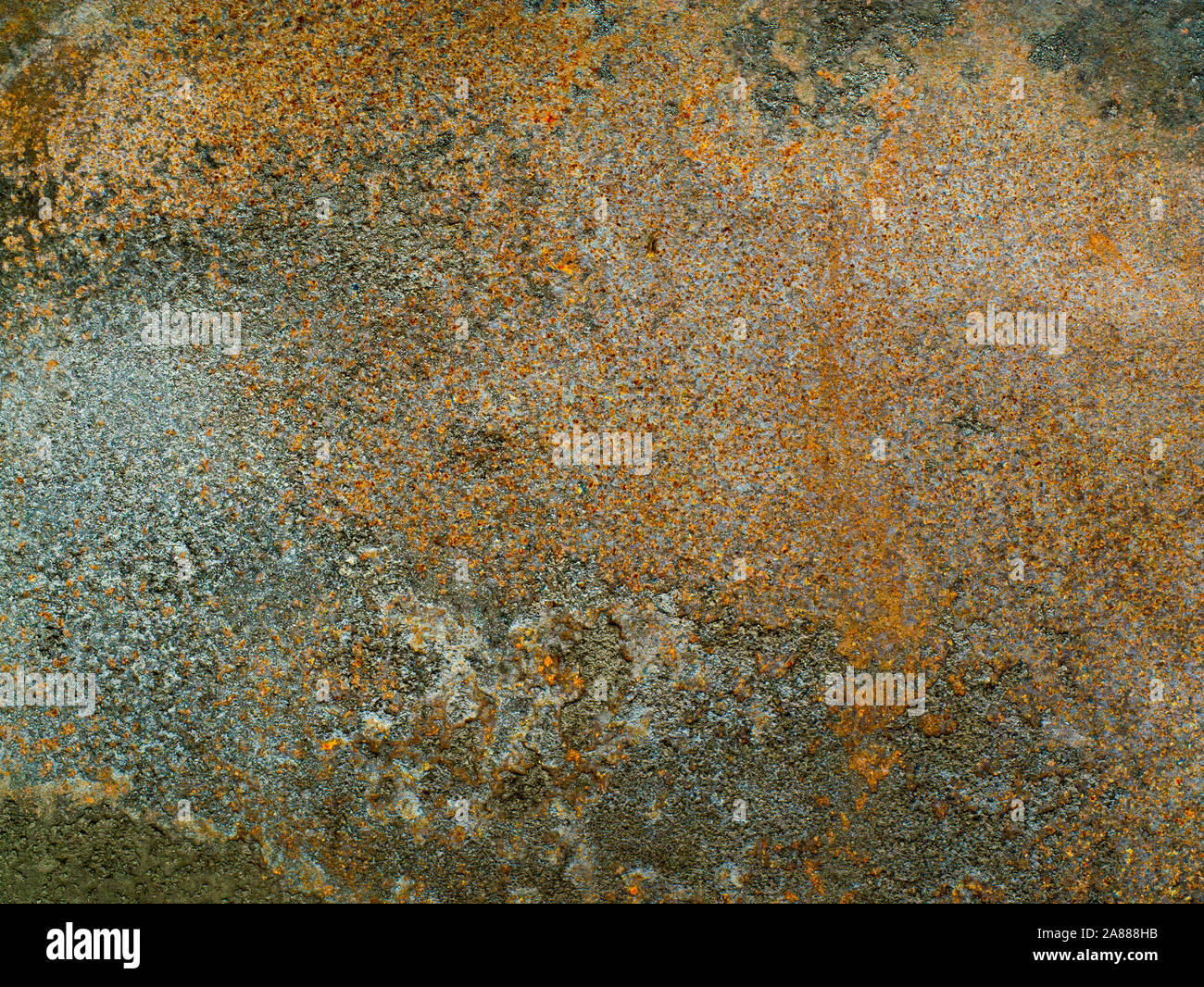 Old brown rusty metal plate is aged and corroded. metallic background ...