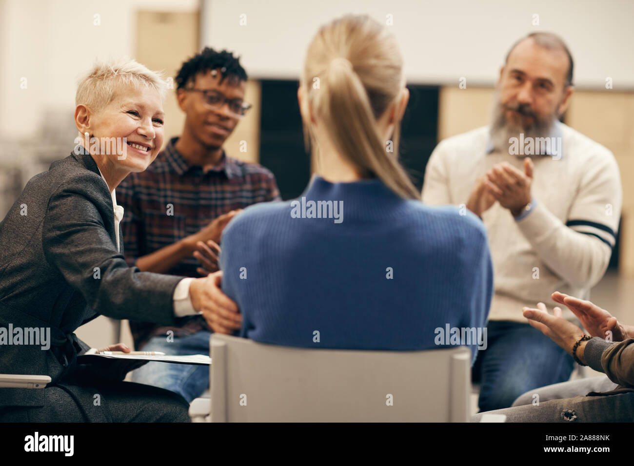 Telling story rear view hi-res stock photography and images - Alamy