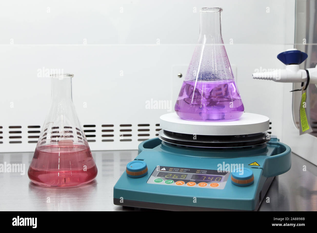 Colorful flasks in laboratory Stock Photo - Alamy