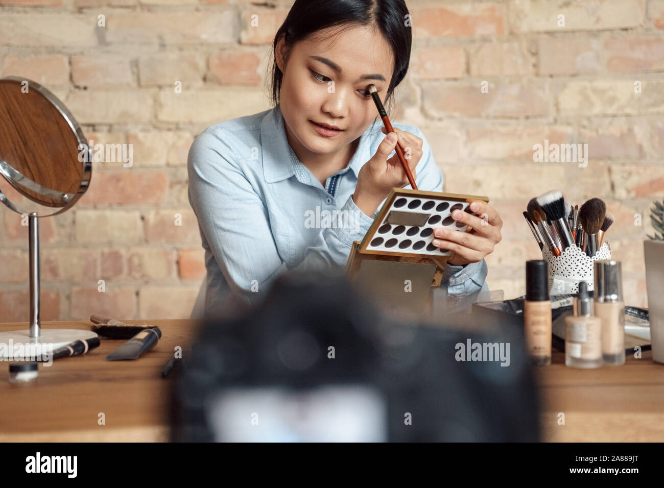 Young adult asian girl making online course with makeup tutorials Stock ...