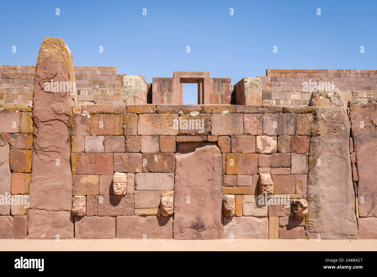 Carved stone tenon-heads on the Semi-underground Temple with the ...