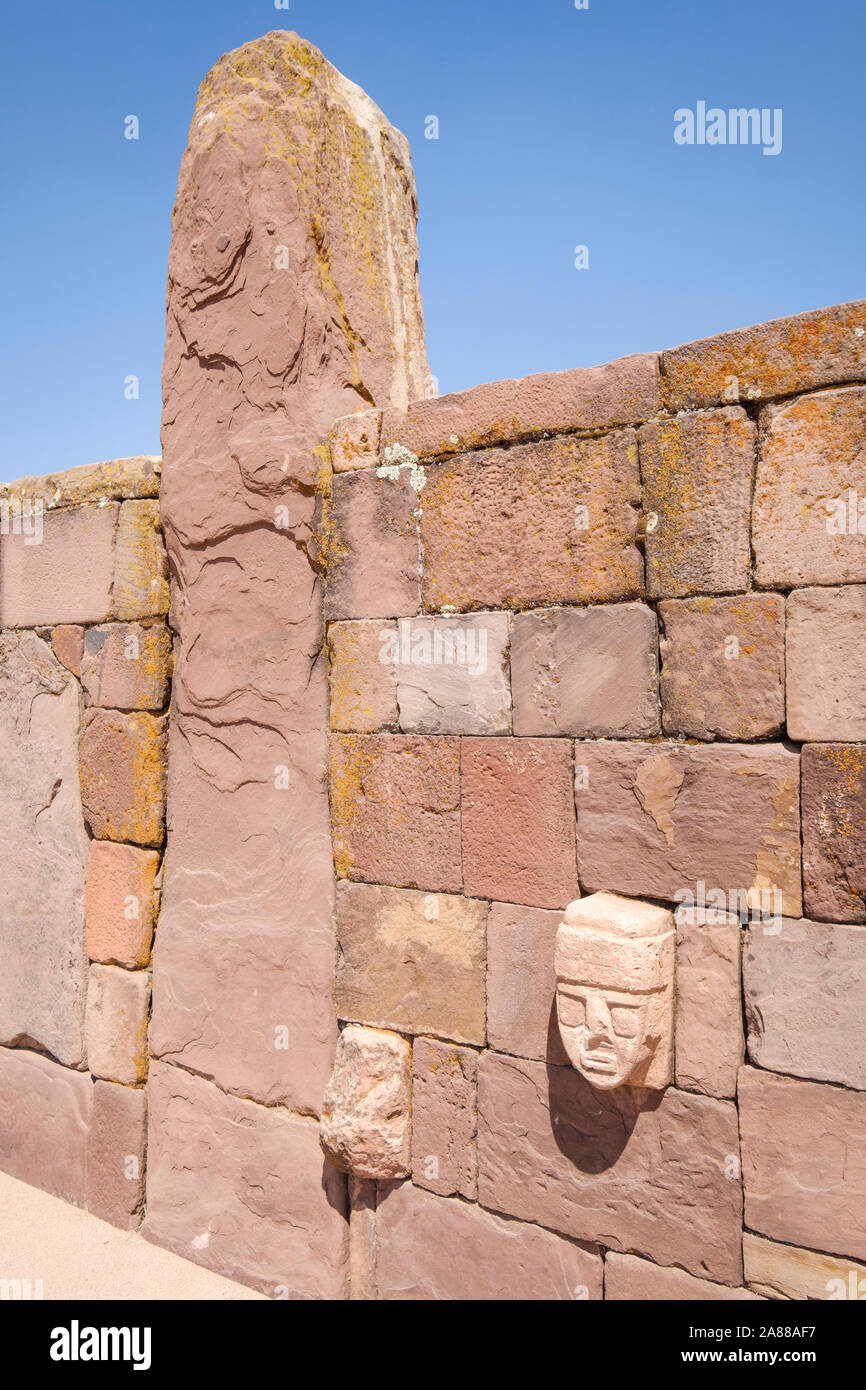 Carved stone tenon heads on the walls of the Semi-underground Temple in ...