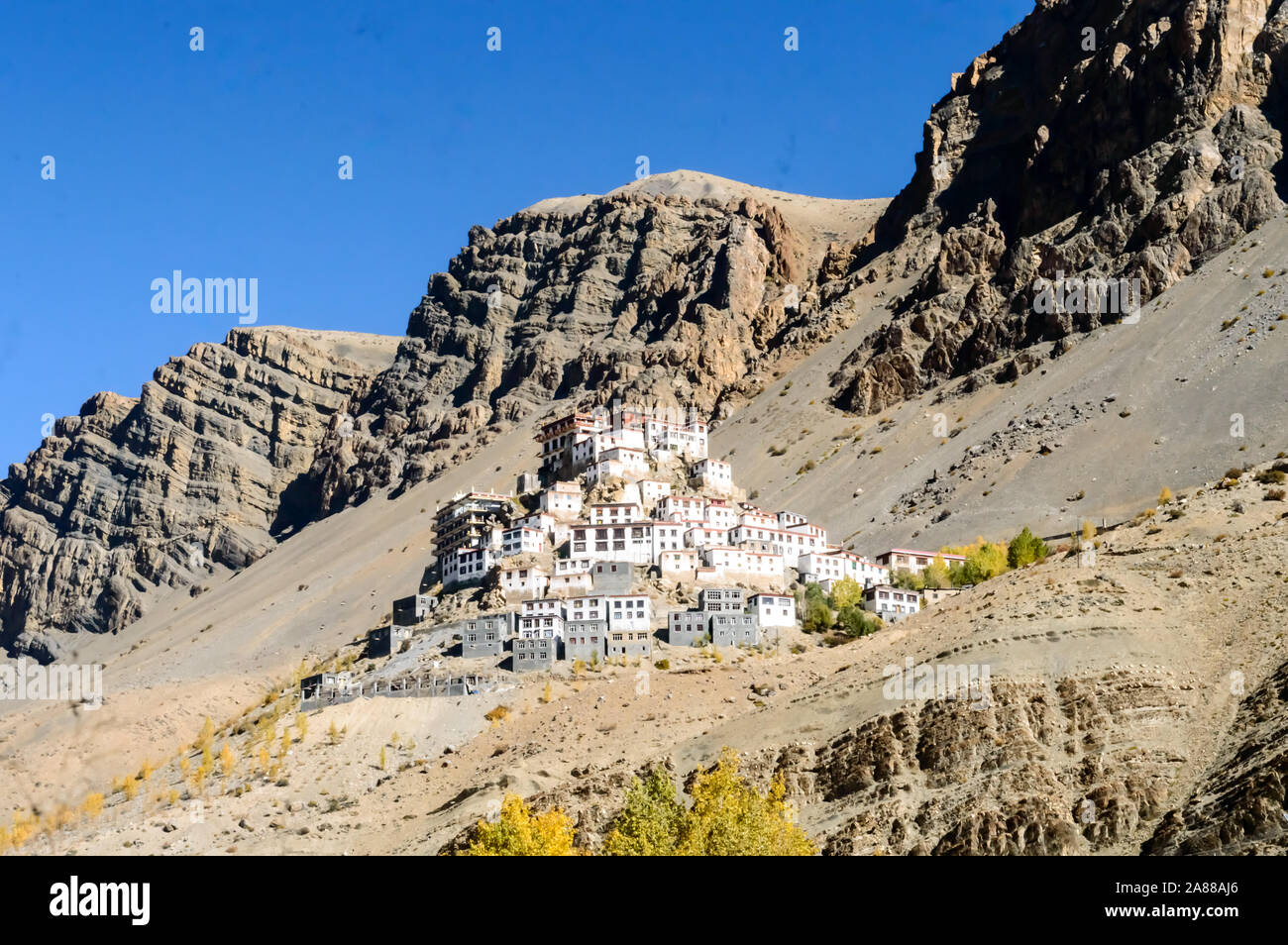 Kye Gompa or Tibetan Buddhist monastery on top of a hill in blue sky ...