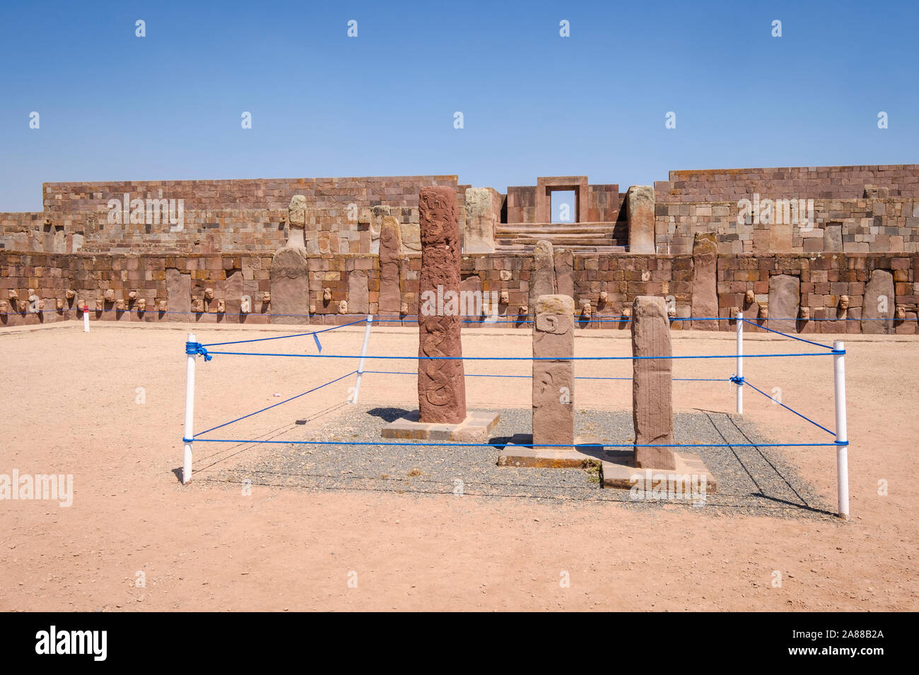 Semi-underground Temple monoliths with the Kalasasaya Temple wall in ...