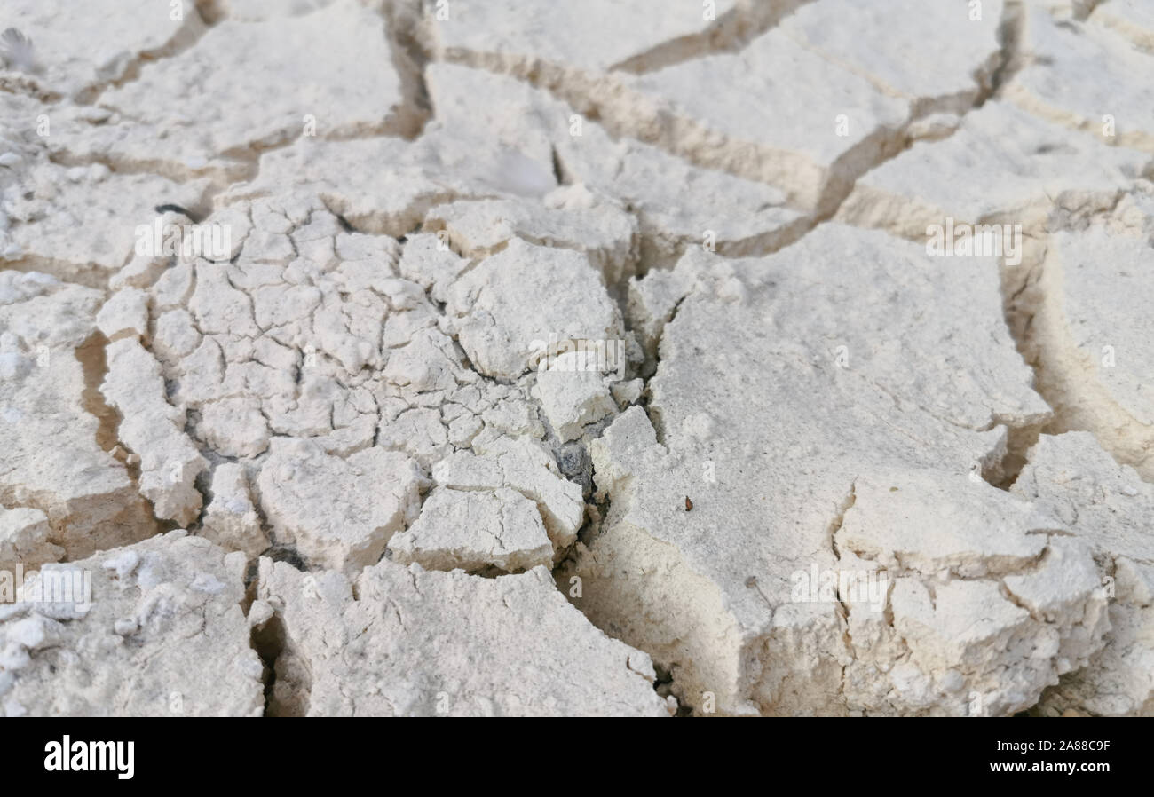 Dry desert clay floor cracked due to summer and drought.Cracked ground ...