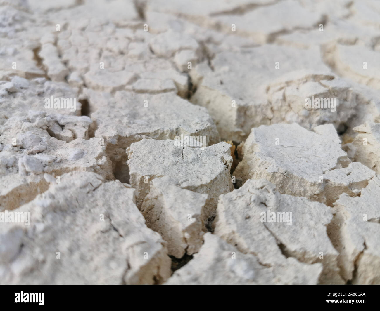 Dry desert clay floor cracked due to summer and drought.Cracked ground ...