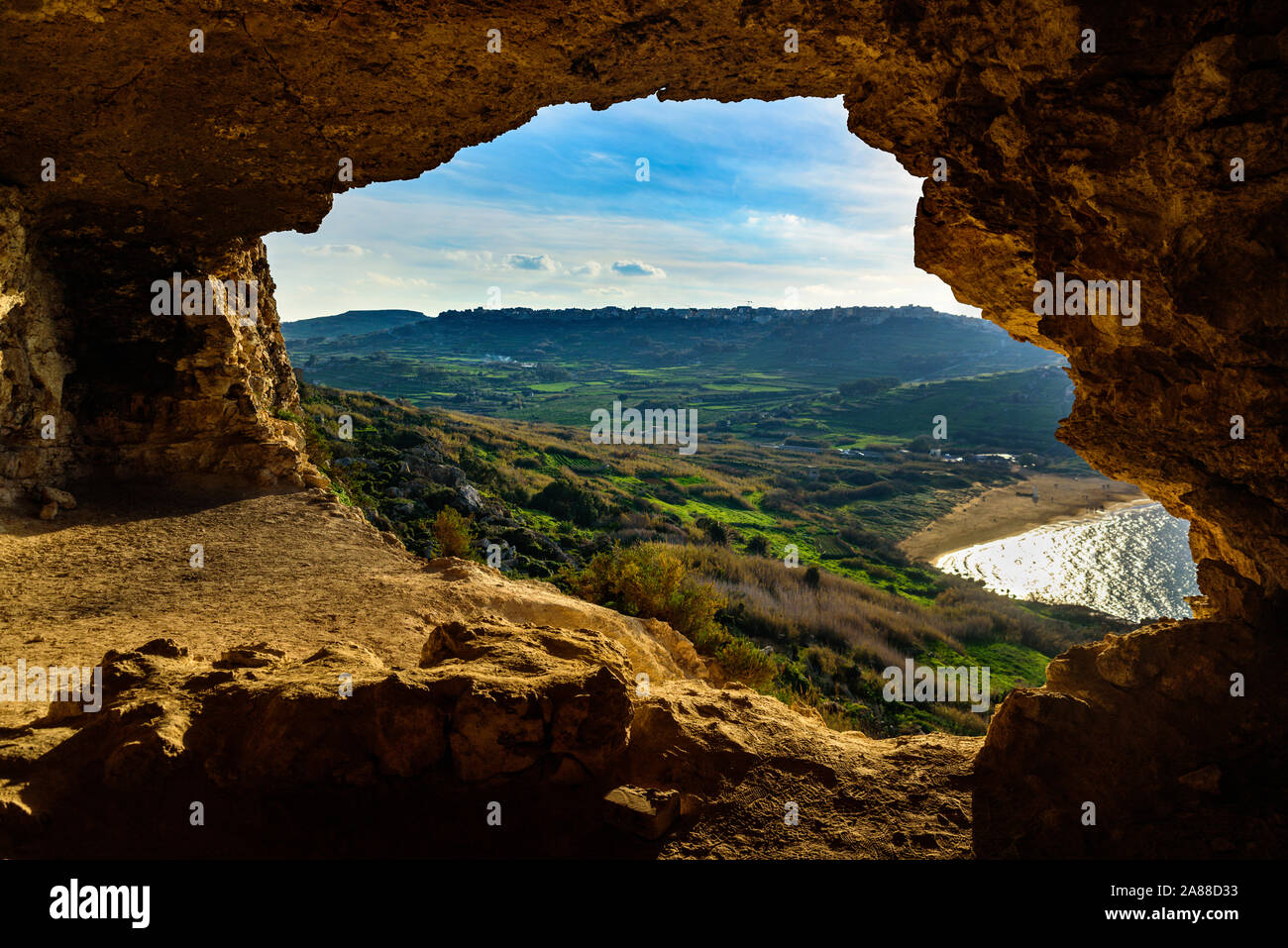 View to Ramla Bay - red sand beach from Tal-Mixta Cave, Gozo, Malta ...