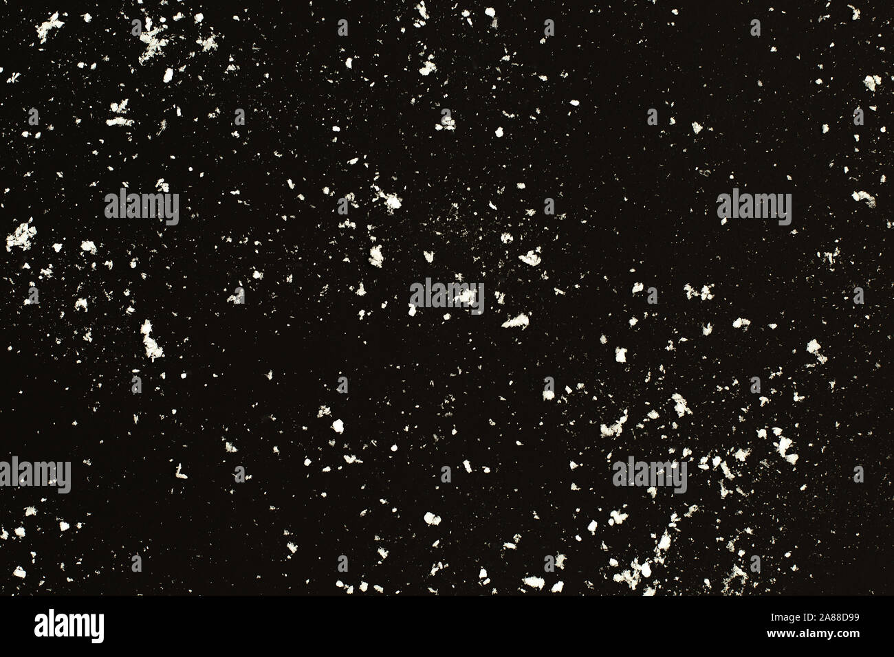 Falling snow on black background. Snowstorm texture. Flying snowflakes ...