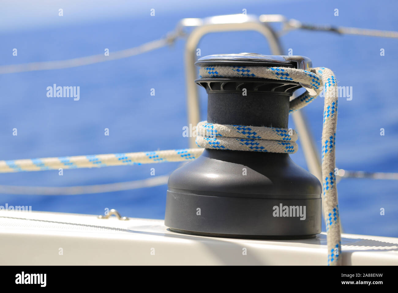 Main halyard winch on sailing boat close up Stock Photo - Alamy