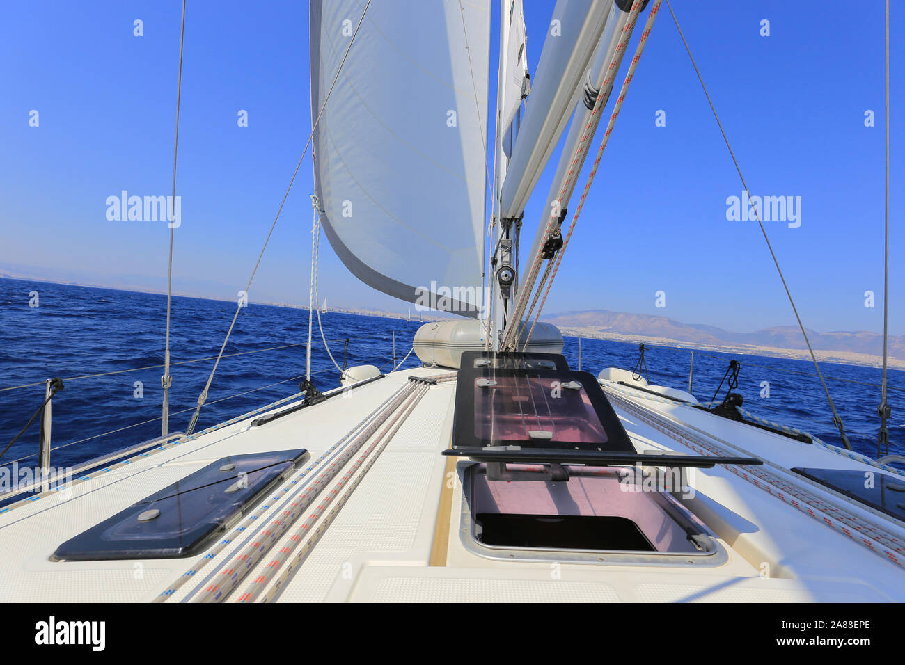 Front view of sailing yacht on the sea Stock Photo - Alamy