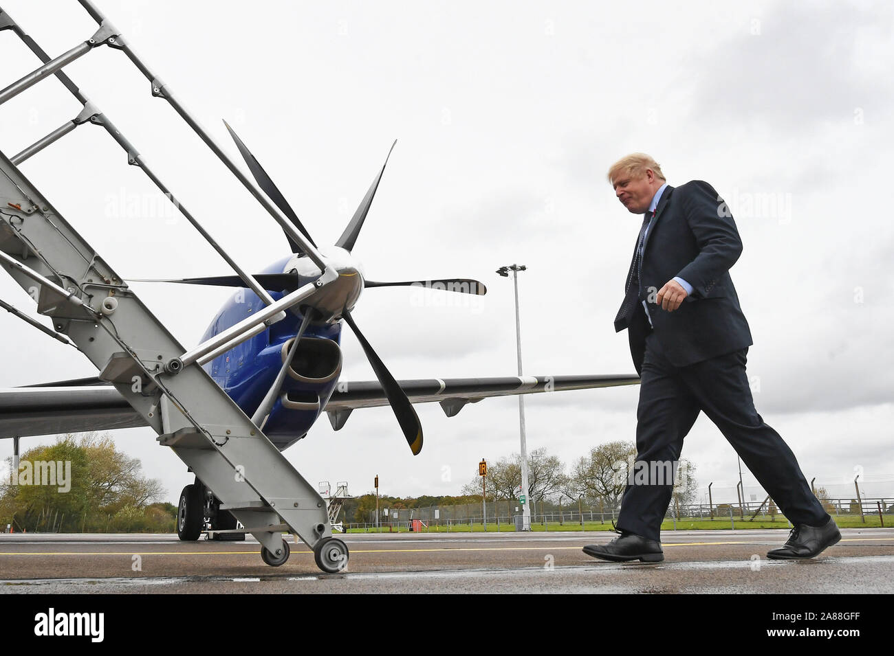 Prime minister boris johnson boards his plane hi-res stock photography ...