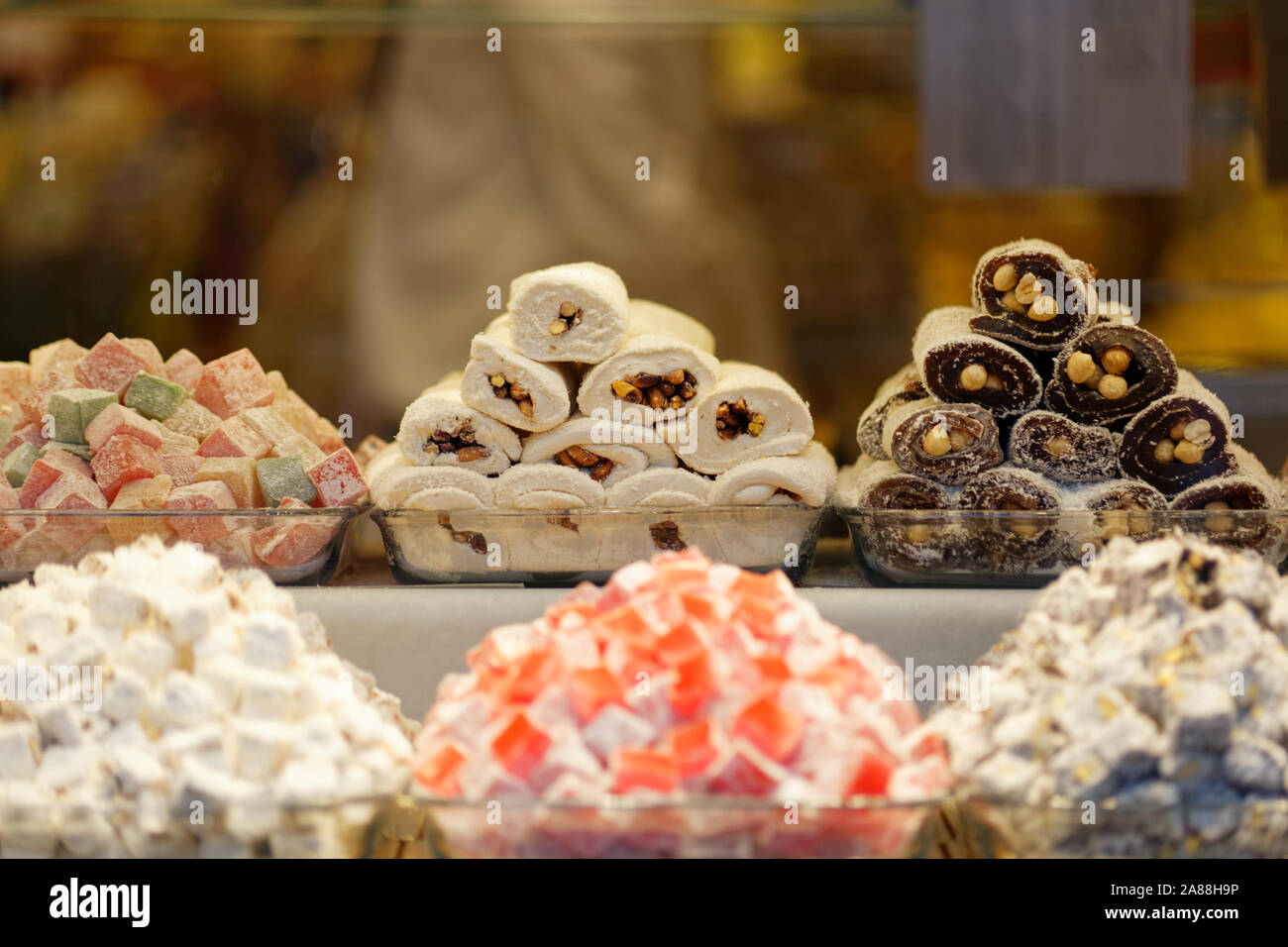 Turkish Delight in white rolled, black rolled, colorful cube forms with ...