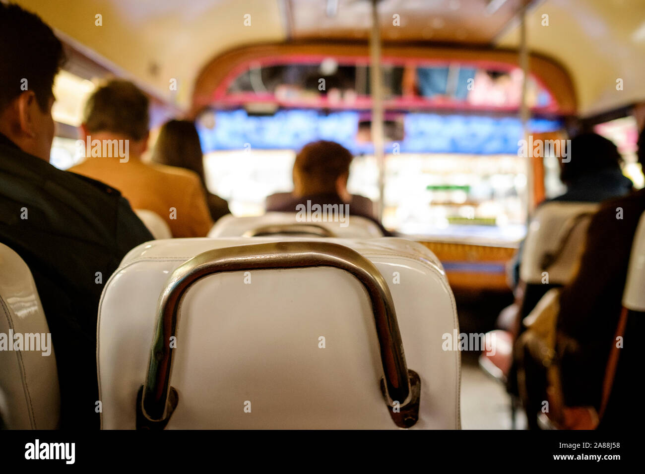 Inside a public bus in La Paz, Bolivia. Selective focus with a blurred ...