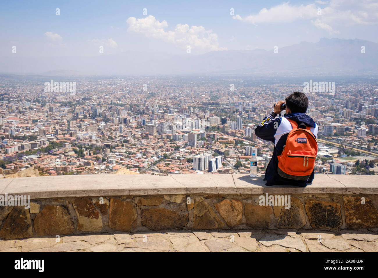 Local boy using binoculars from the top of the Cerro de San Pedro in ...