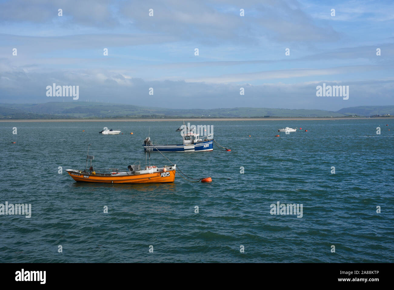 Small fishing boats in the Dyfi estuary, Cardigan Bay, from Aberdovey ...