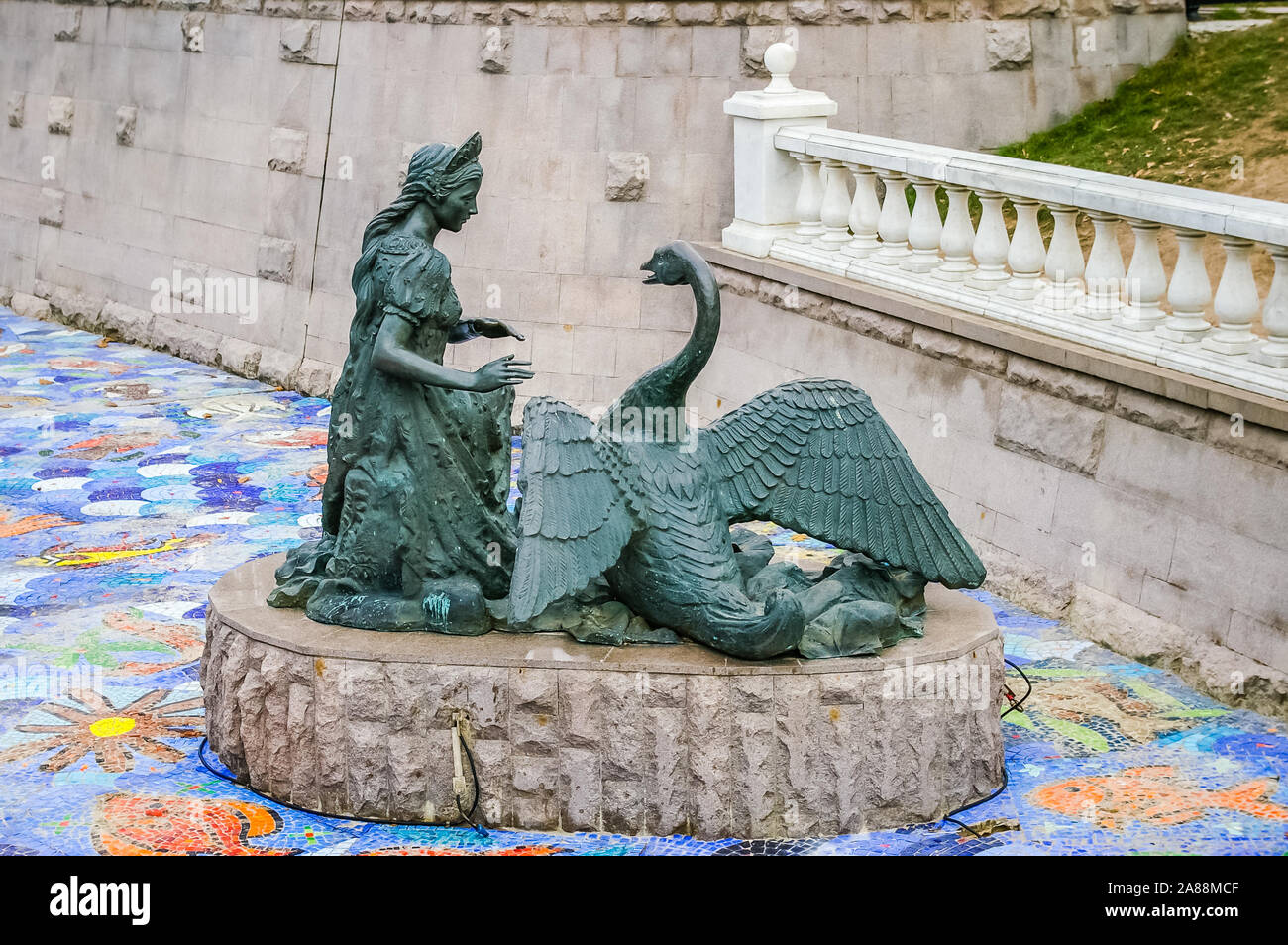 Young lady and Swan sculpture in Moscow, Russia Stock Photo - Alamy