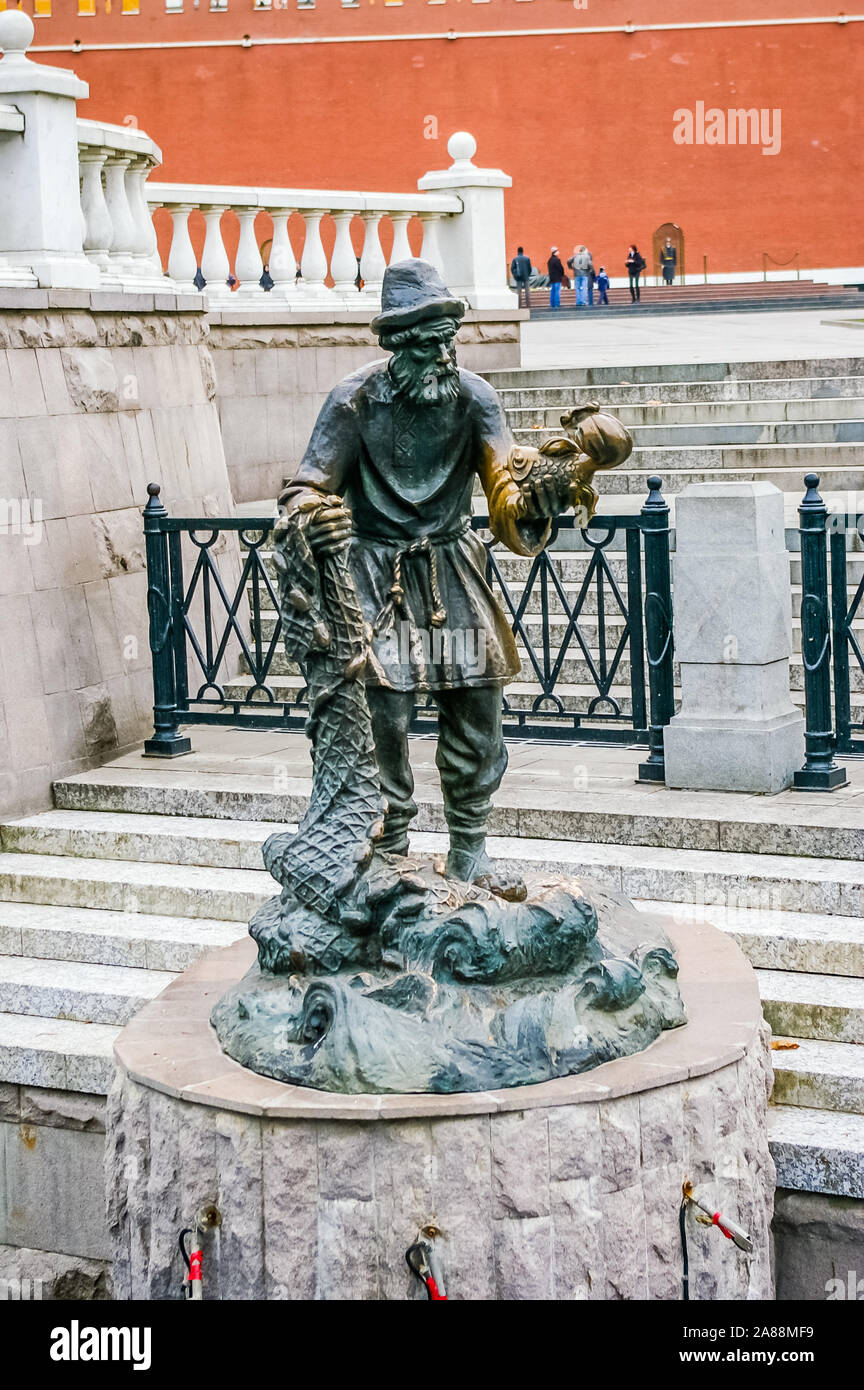Old man and fish sculpture in Moscow, Russia Stock Photo - Alamy