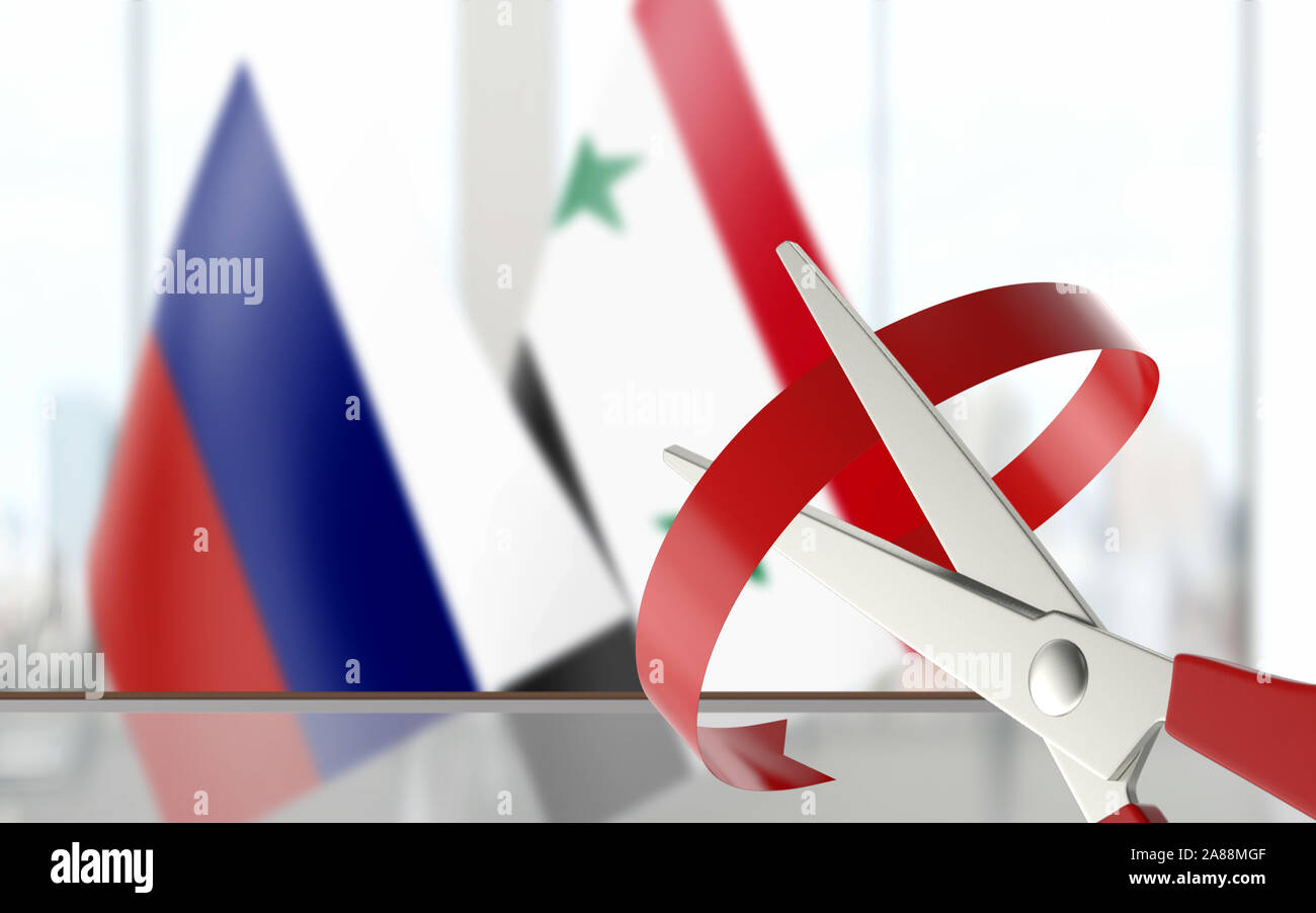 Flags are paired together at an office background while scissor is ...