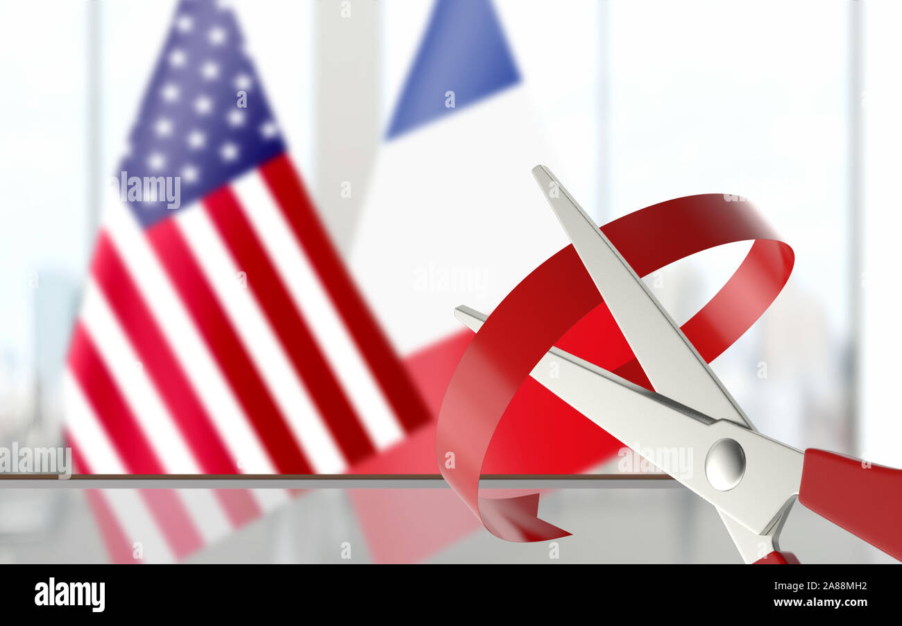 Flags are paired together at an office background while scissor is ...