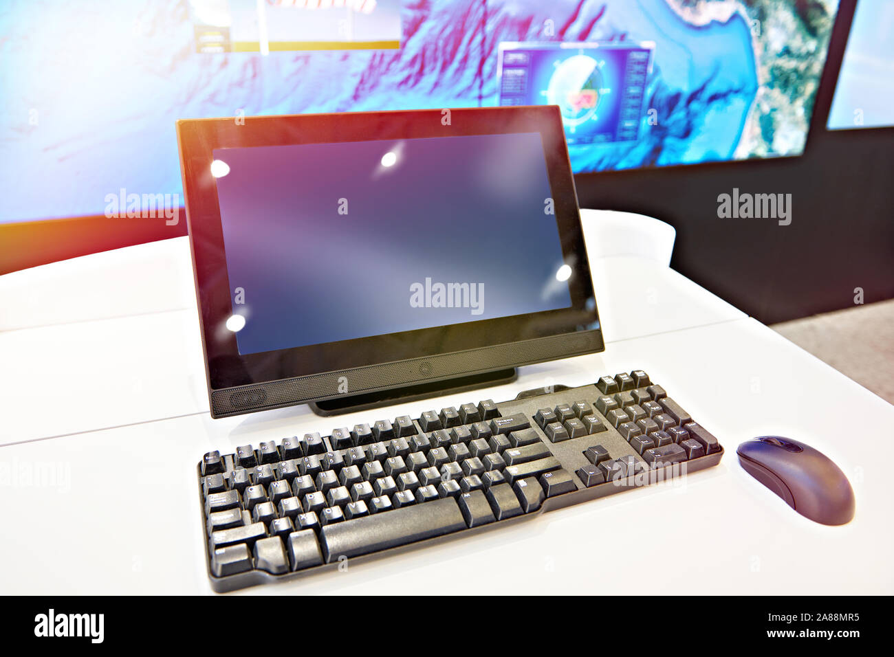 Workplace with keyboard mouse and monitors Stock Photo - Alamy