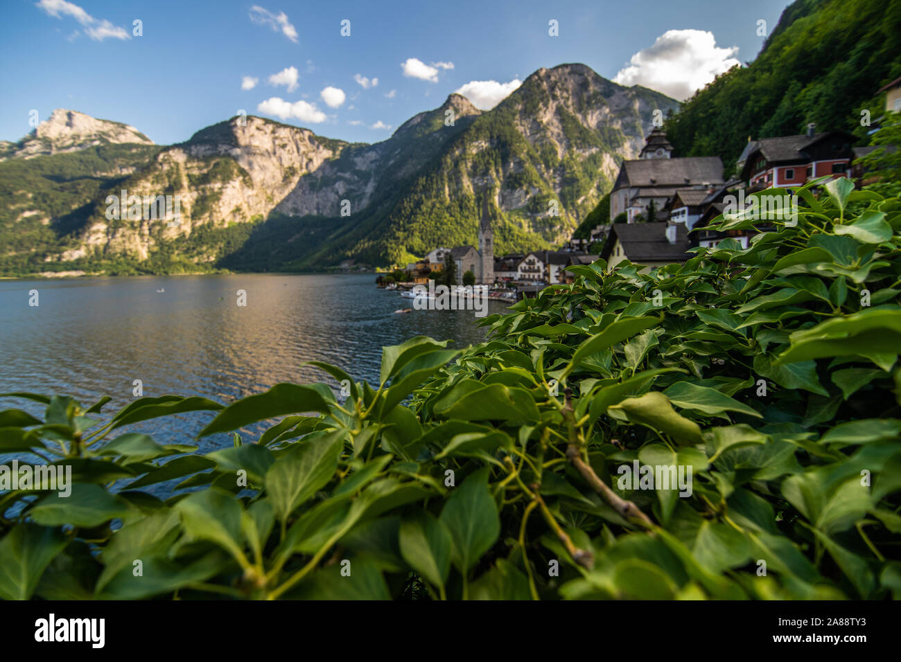 HALLSTATT, AUSTRIA - July, 2019: Scenic picture-postcard view of famous Hallstatt mountain ...