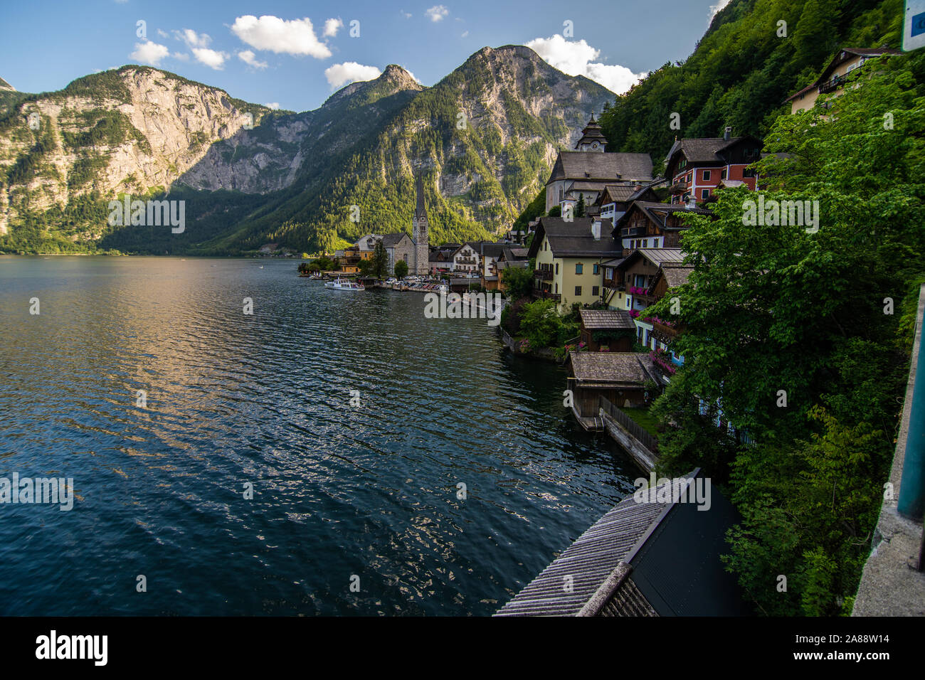 HALLSTATT, AUSTRIA - July, 2019: Scenic picture-postcard view of famous Hallstatt mountain ...