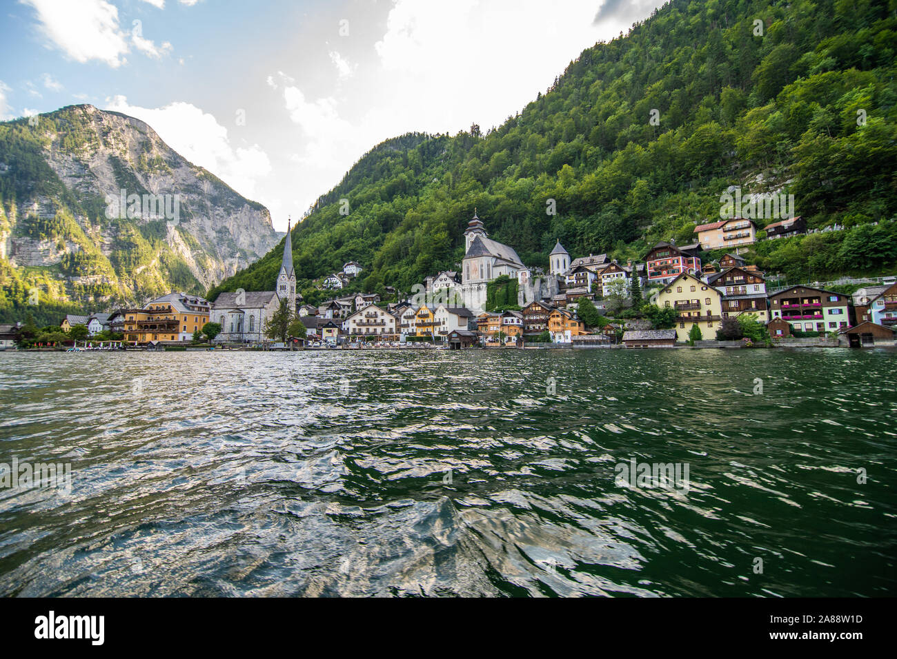 HALLSTATT, AUSTRIA - July, 2019: Scenic picture-postcard view of famous ...