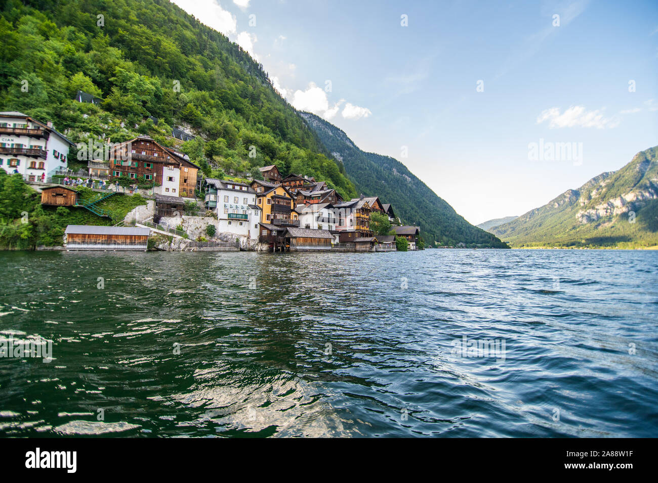 HALLSTATT, AUSTRIA - July, 2019: Scenic picture-postcard view of famous Hallstatt mountain ...