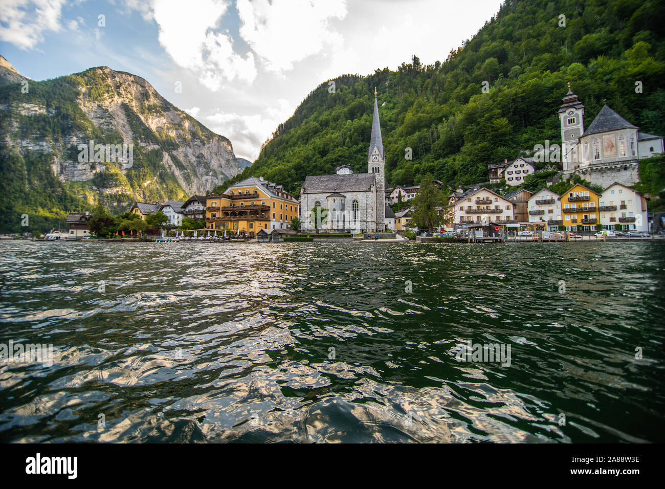 HALLSTATT, AUSTRIA - July, 2019: Scenic picture-postcard view of famous Hallstatt mountain ...
