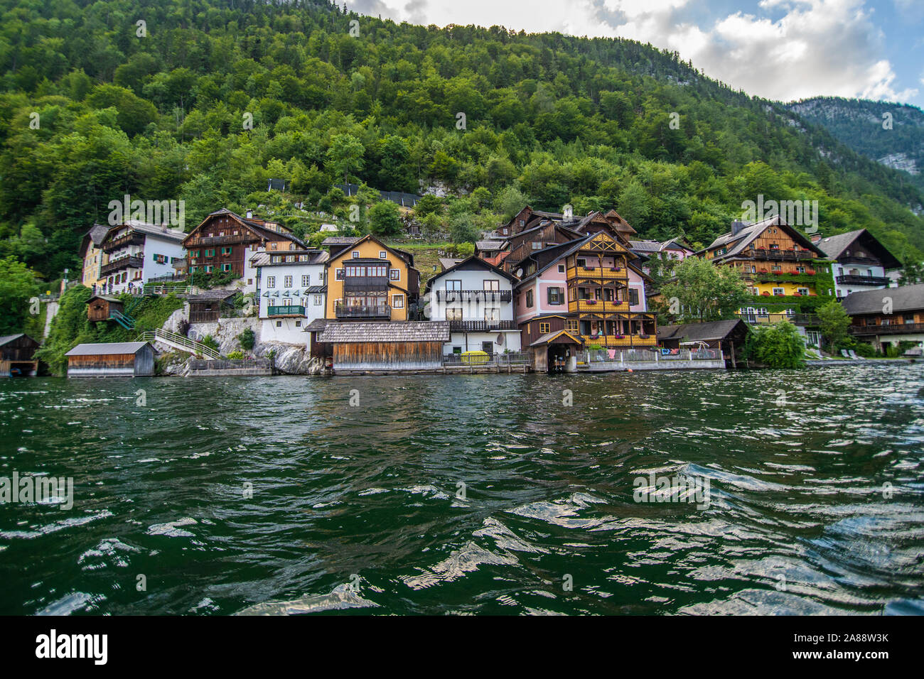 HALLSTATT, AUSTRIA - July, 2019: Scenic picture-postcard view of famous Hallstatt mountain ...