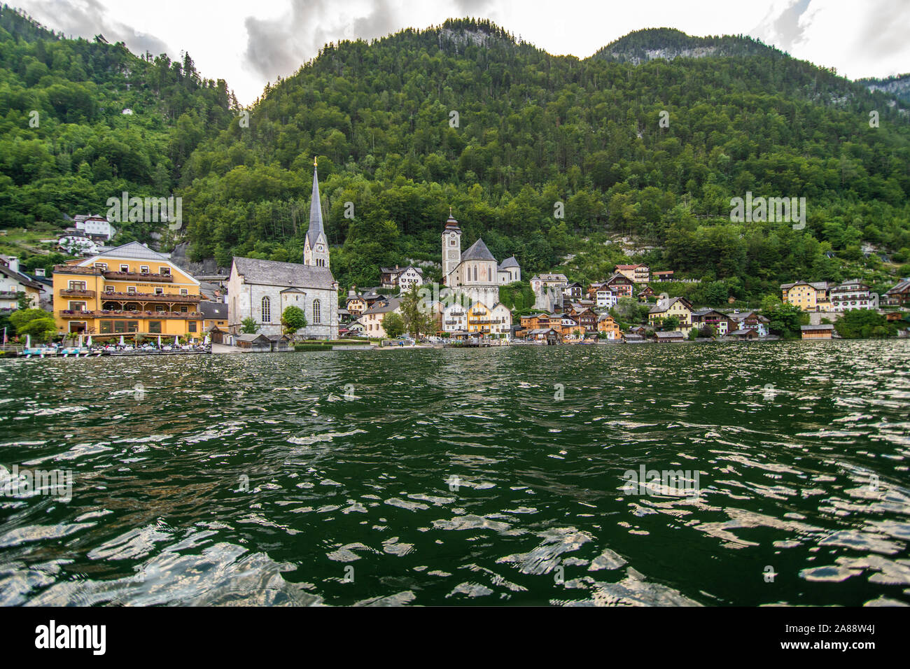 HALLSTATT, AUSTRIA - July, 2019: Scenic picture-postcard view of famous ...