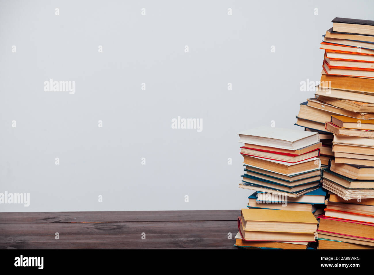 stacks of educational books university library background Stock Photo ...