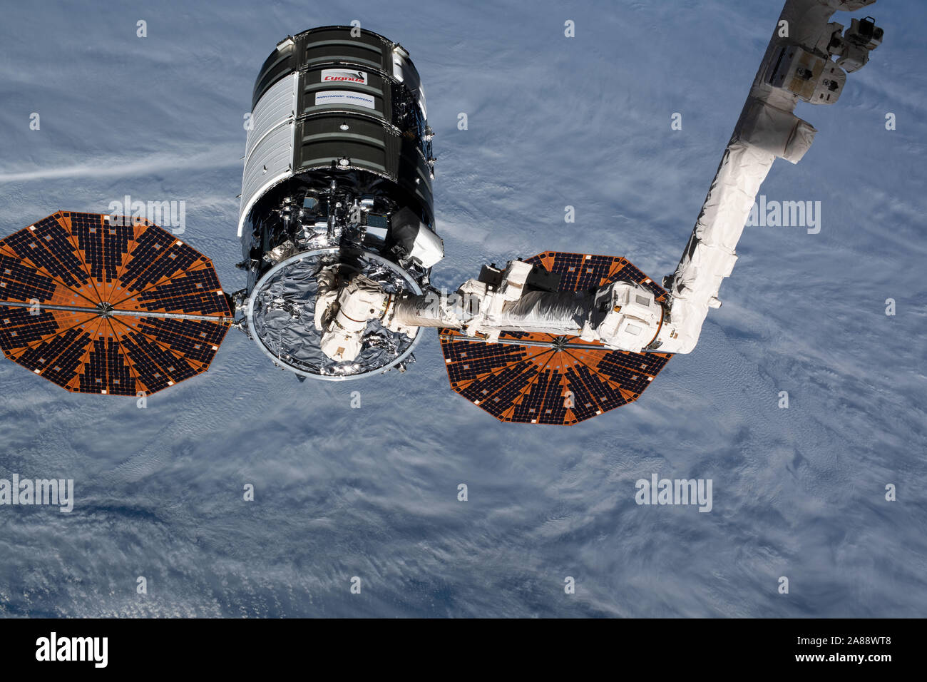 The Northrop Grumman Cygnus space freighter is grappled by the ...