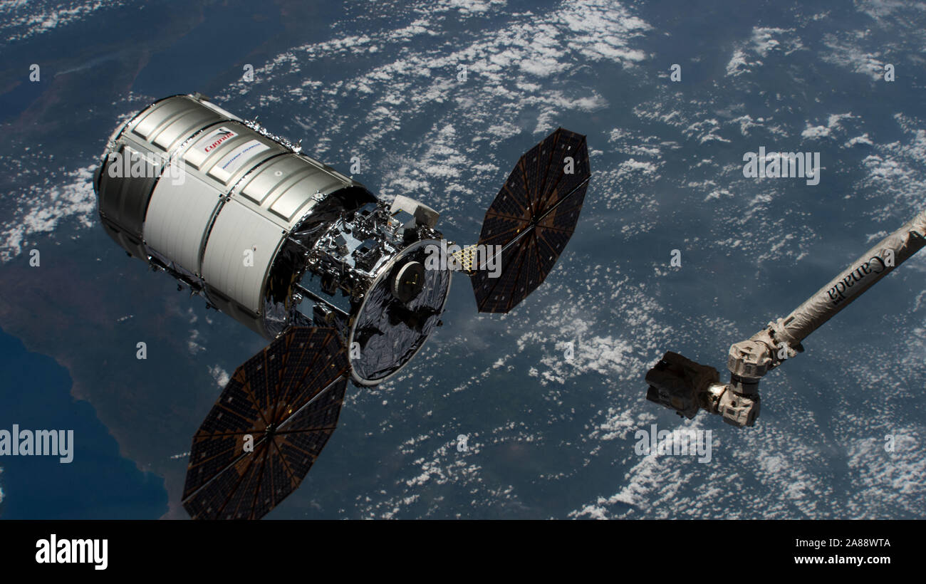The Northrop Grumman Cygnus space freighter is grappled by the ...
