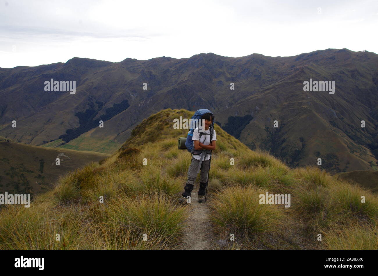 Thai female backpacker Te Araroa Trail. Motatapu Alpine Track. South ...