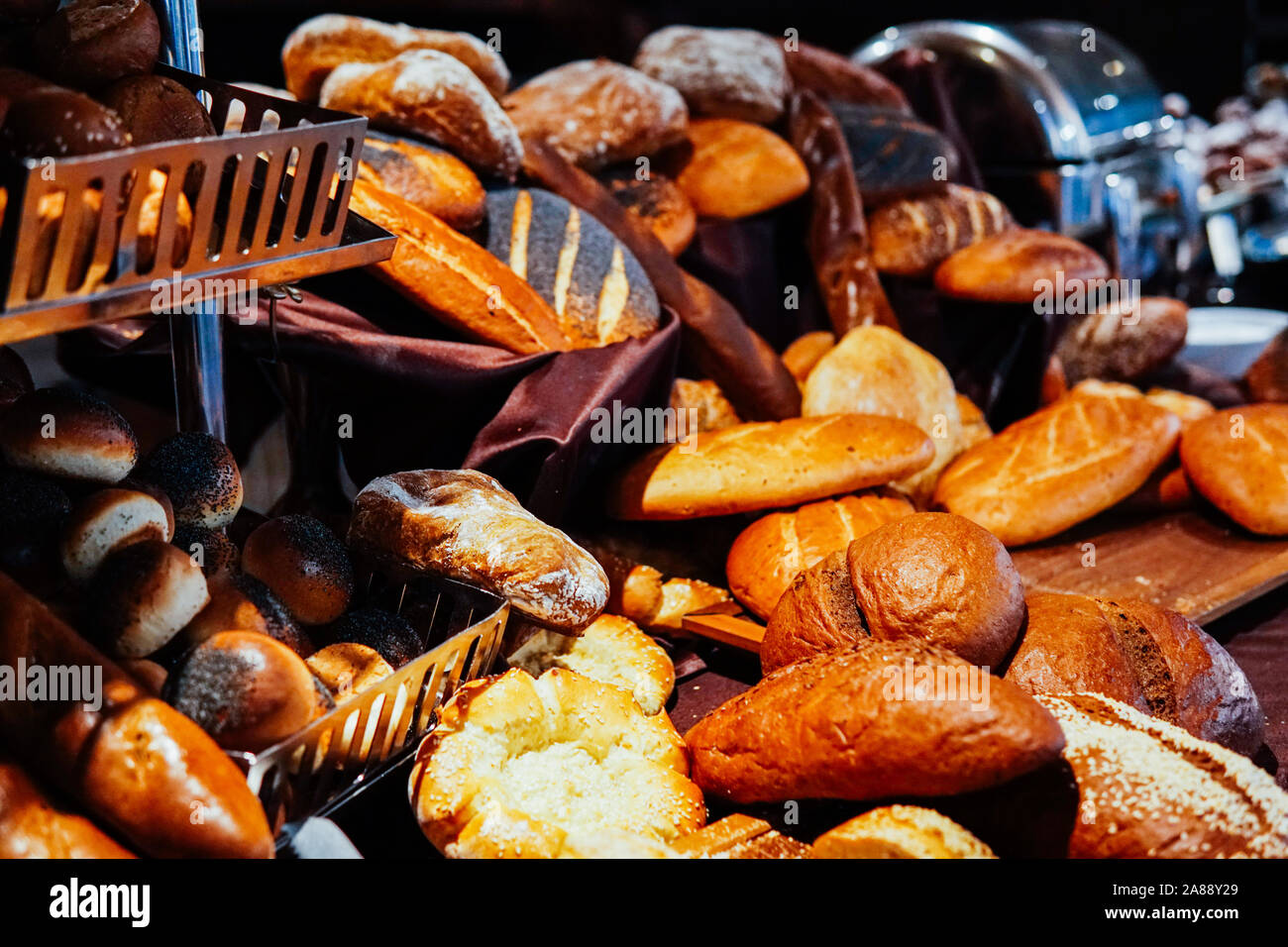 different bread rolls on the table bakeries Stock Photo - Alamy