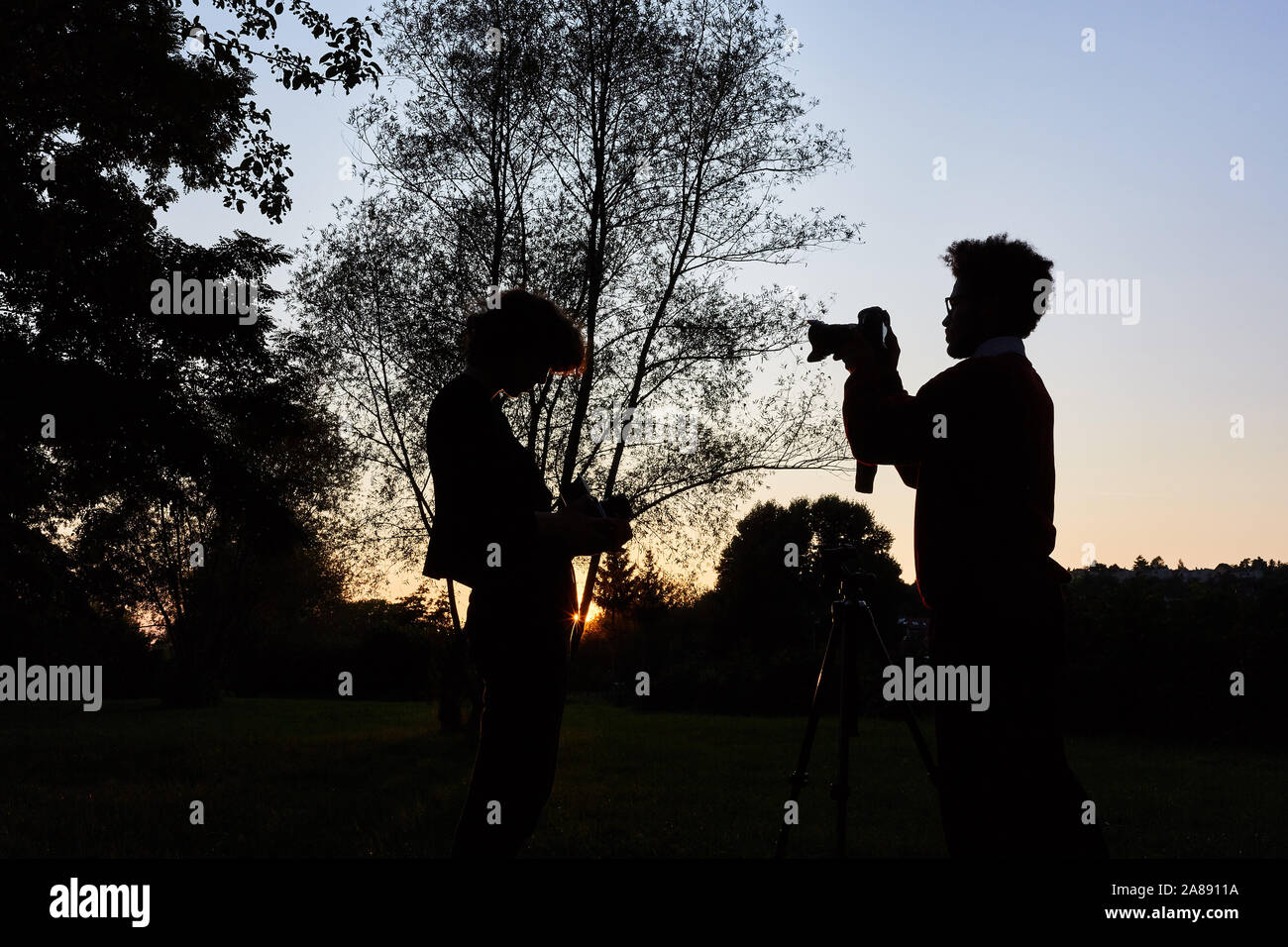 Photographer with two cameras hi-res stock photography and images - Alamy