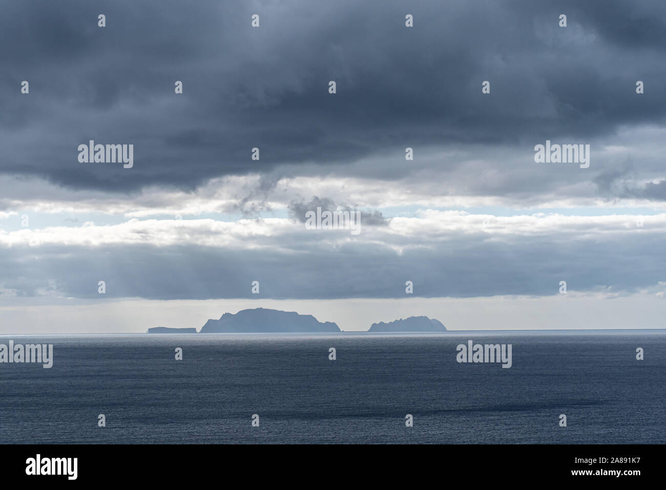 Storm clouds above island madeira hi-res stock photography and images ...