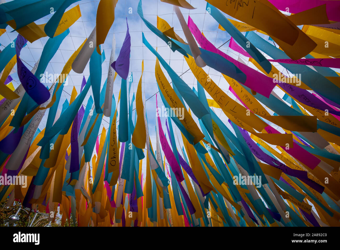 Messages of peace and hope written on ribbons as part of Vision in ...