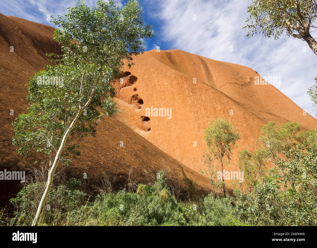 Uluru, or Ayers Rock, is a massive sandstone monolith in the heart of ...