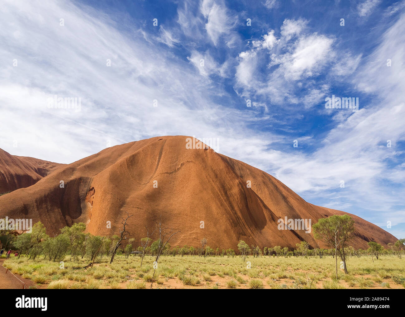 Uluru, or Ayers Rock, is a massive sandstone monolith in the heart of ...