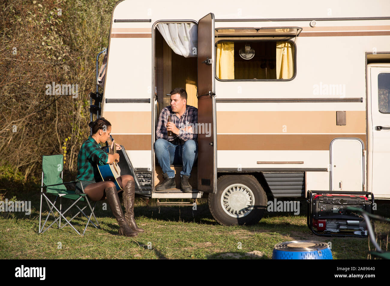 Beautiful young girlfriend singing for her boyfriend in front of their ...