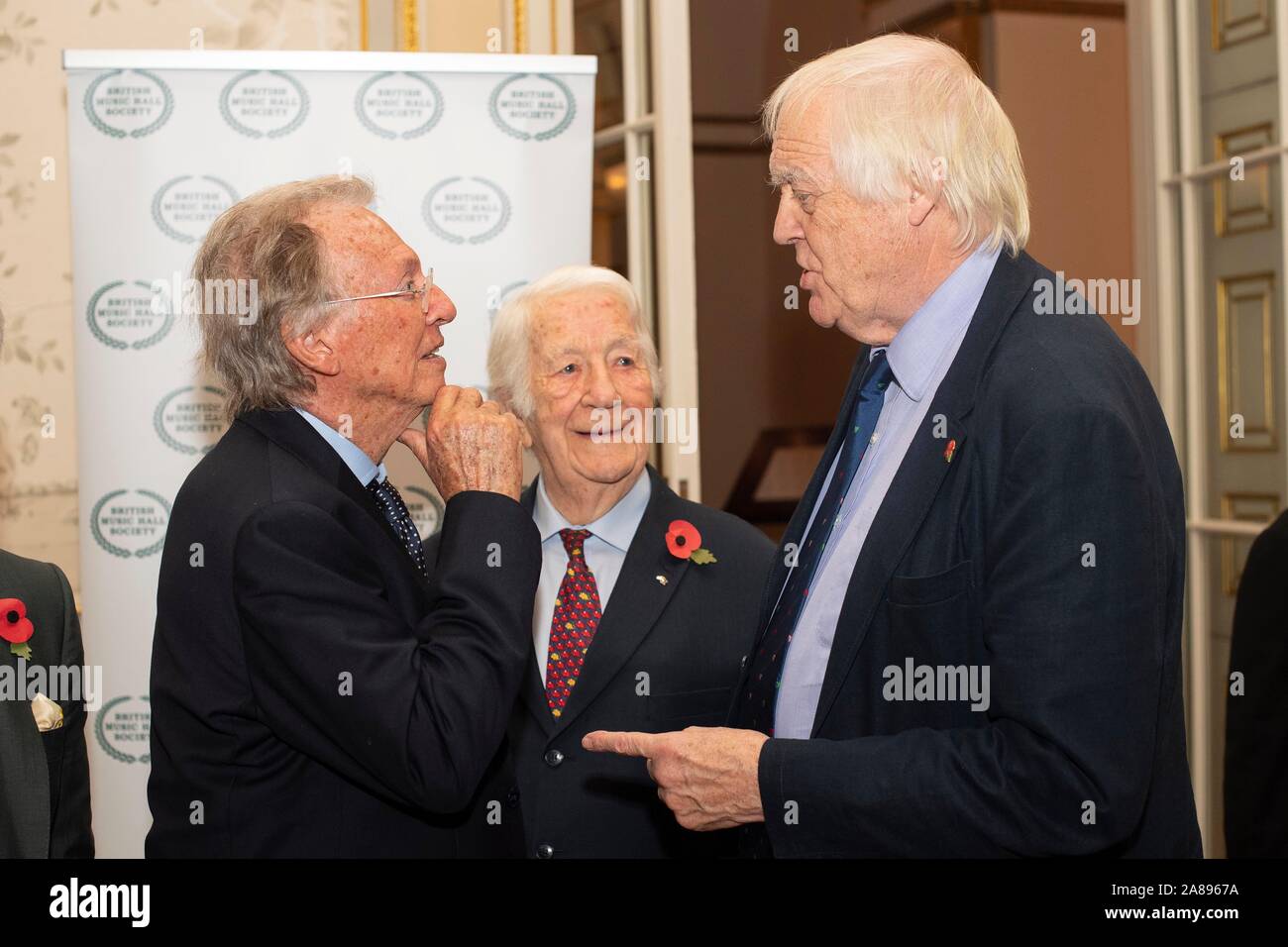 Veteran entertainer Tommy Steele talks with Wyn Calvin (centre) and Tim ...