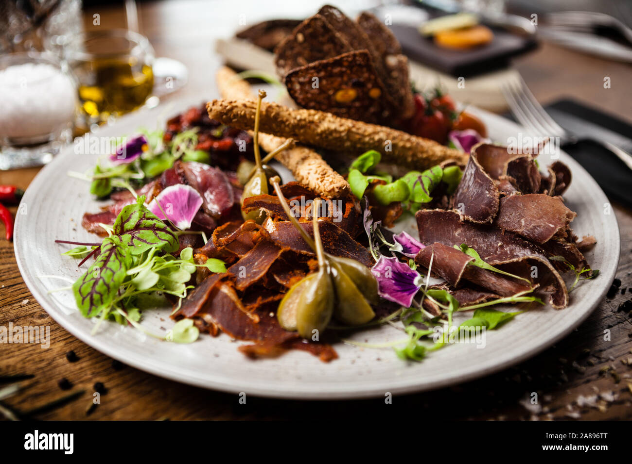 Meat platter for two: Dry-aged beef brisket, dry-aged duck fillet, beef ...