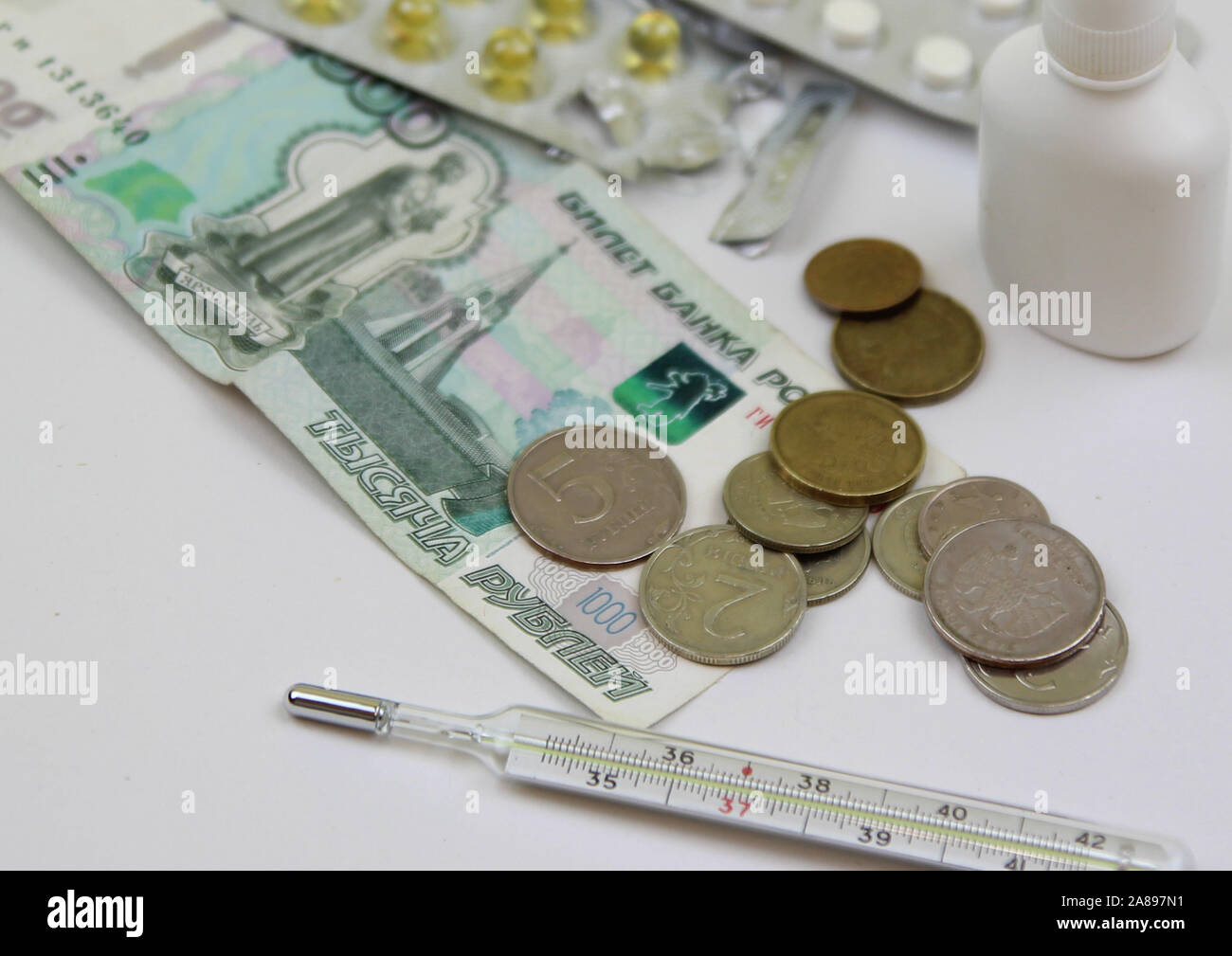 Money and thermometer. Concept, expensive medicine, high temperature ...