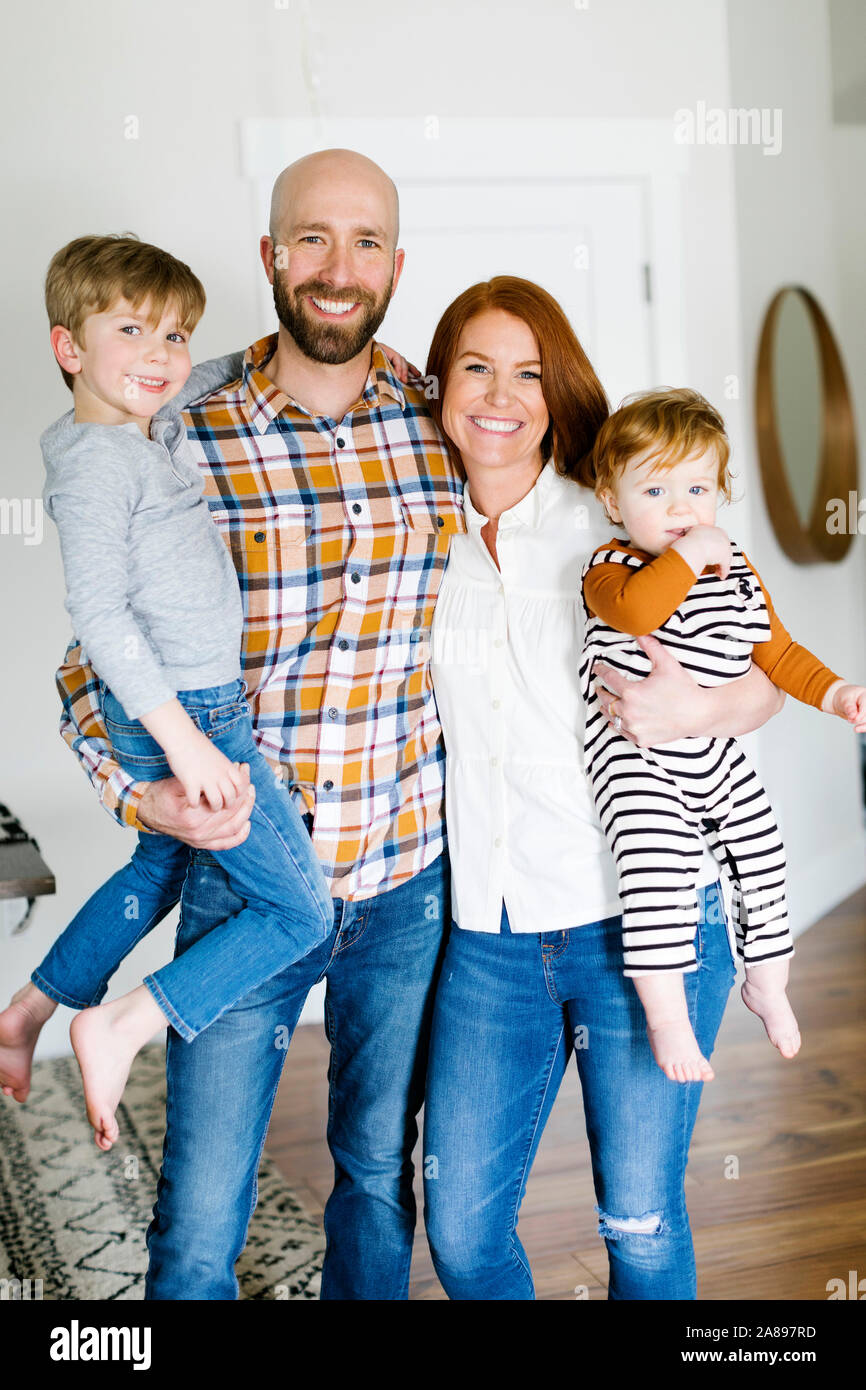 Family in home hi-res stock photography and images - Alamy