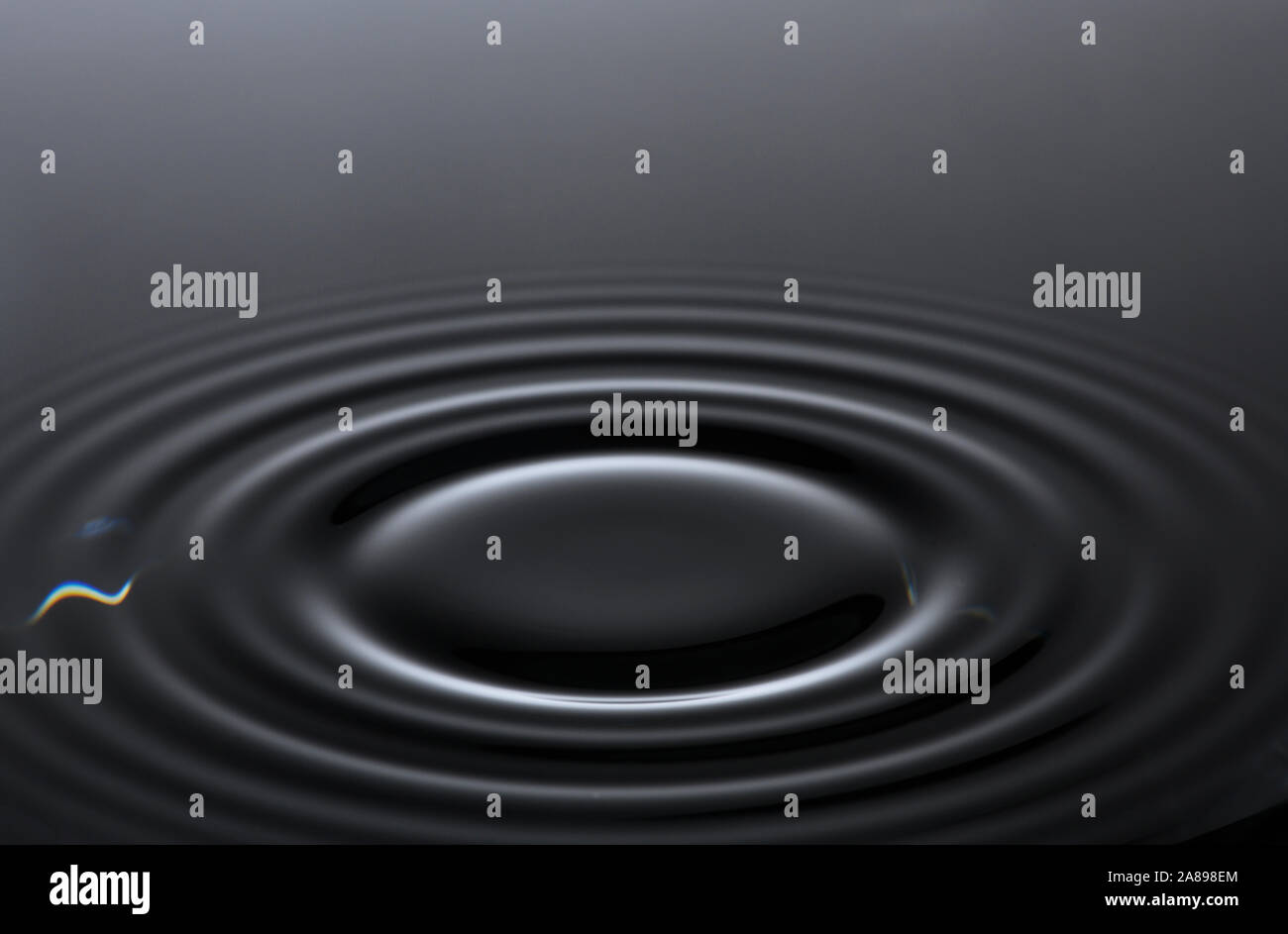 Circular ripples in water Stock Photo - Alamy