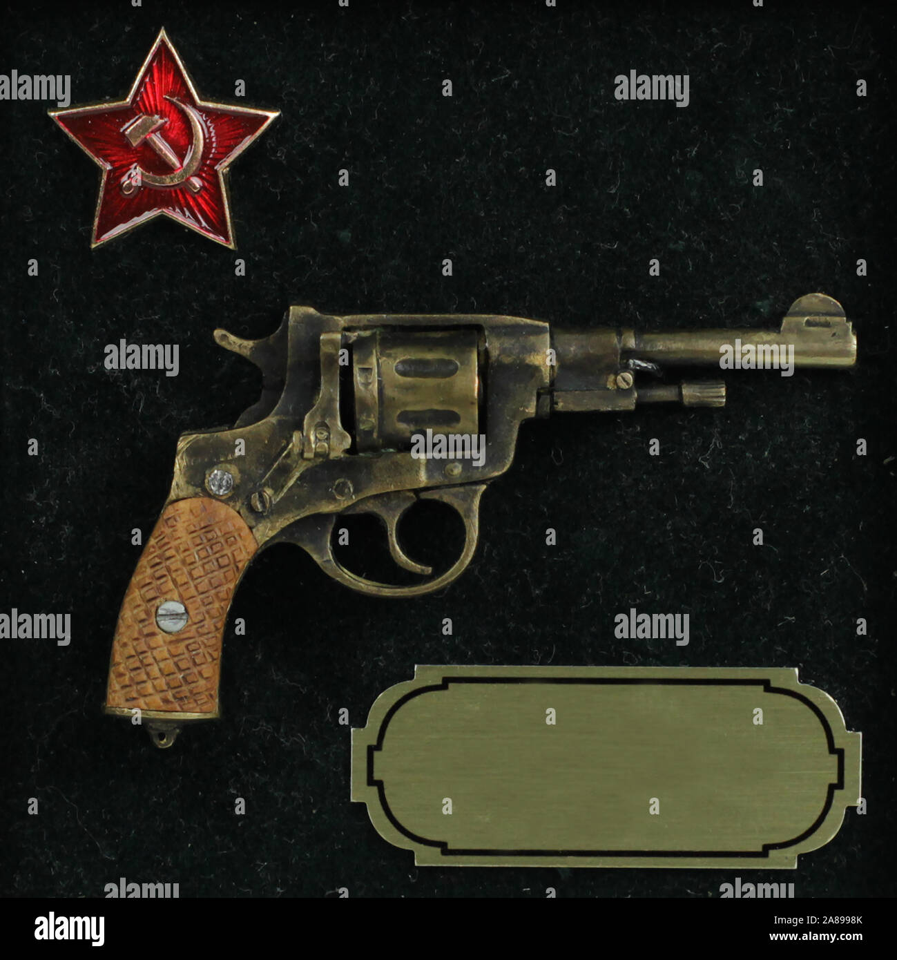 Revolver and star of the red Army with a blank sign for Your text ...