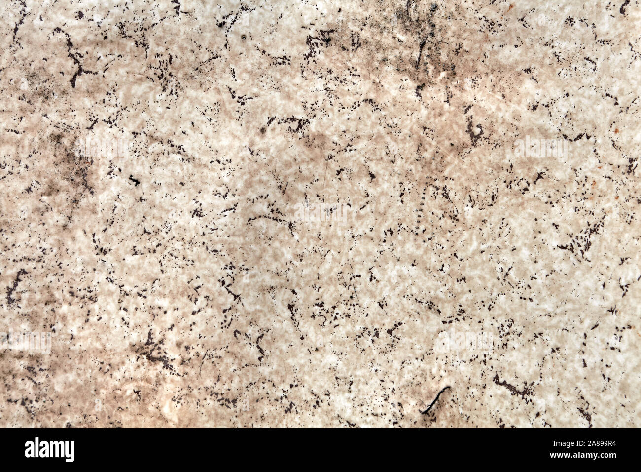 Dirty old abandoned panel of artificial granite or marble, imitation of ...