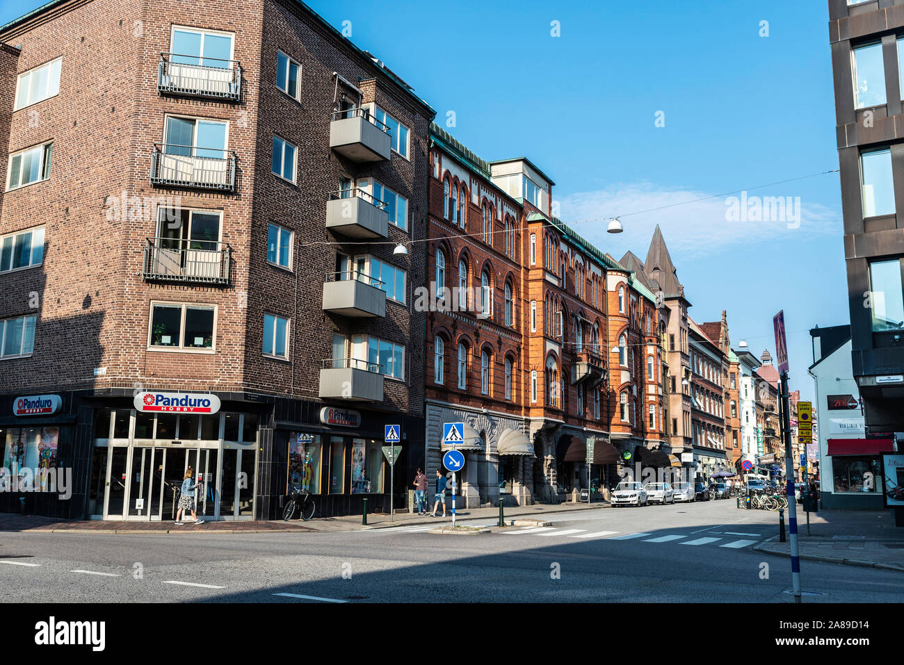 Malmo, Sweden - August 28, 2019: Street with bar and shops, traffic and ...